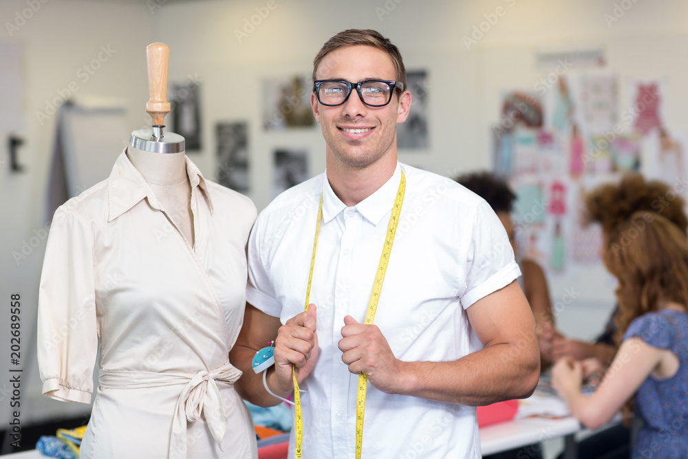 Male Fashion Designer At Work