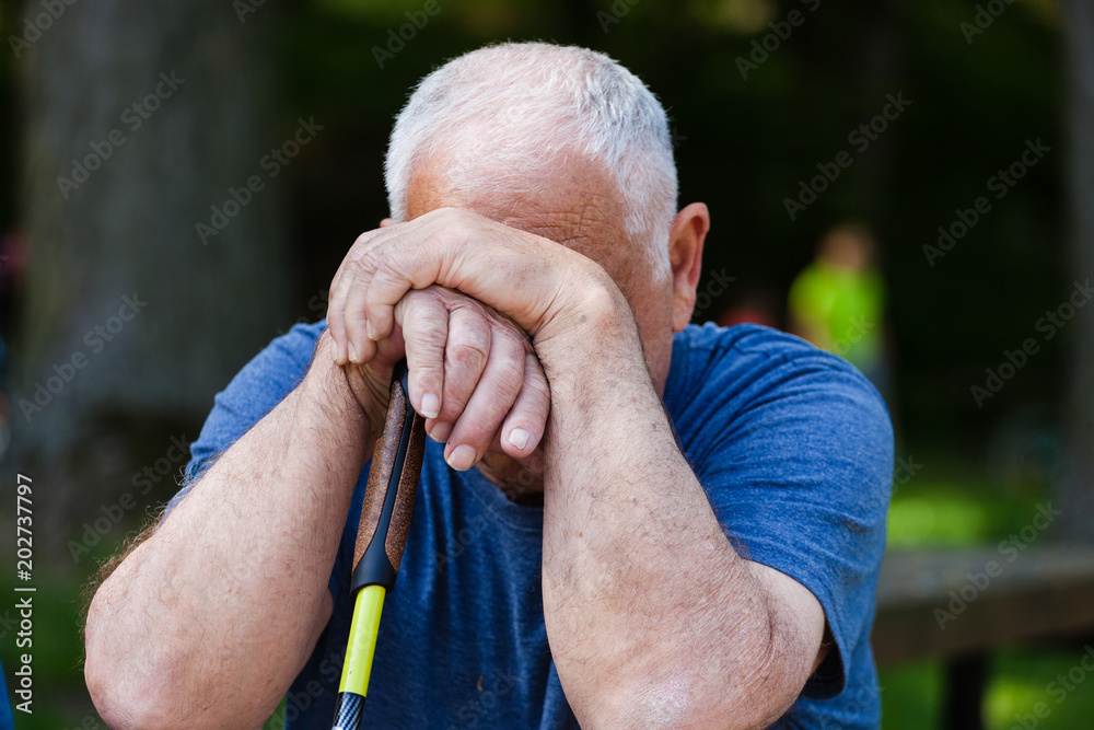 Sad, hunched old man Stock Photo | Adobe Stock
