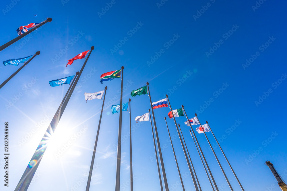 flag of the world with blue sky Stock Photo | Adobe Stock