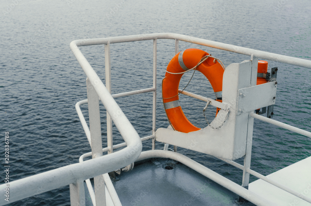 view from wing of ocean ship at sea or sailing through calm ocean ...