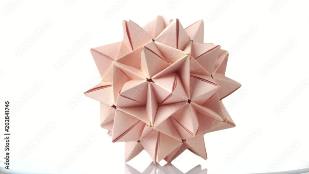 Spiky ball origami figure. Beautiful origami model made from a lot of ...