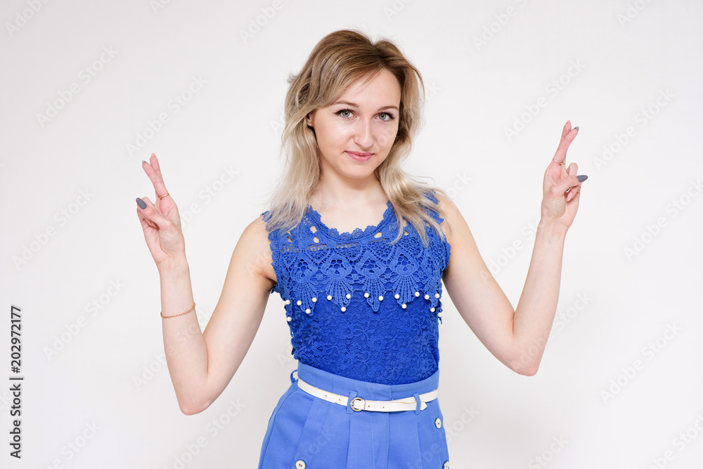 all Ok, you will succeed. Portrait of a beautiful blonde girl on a ...