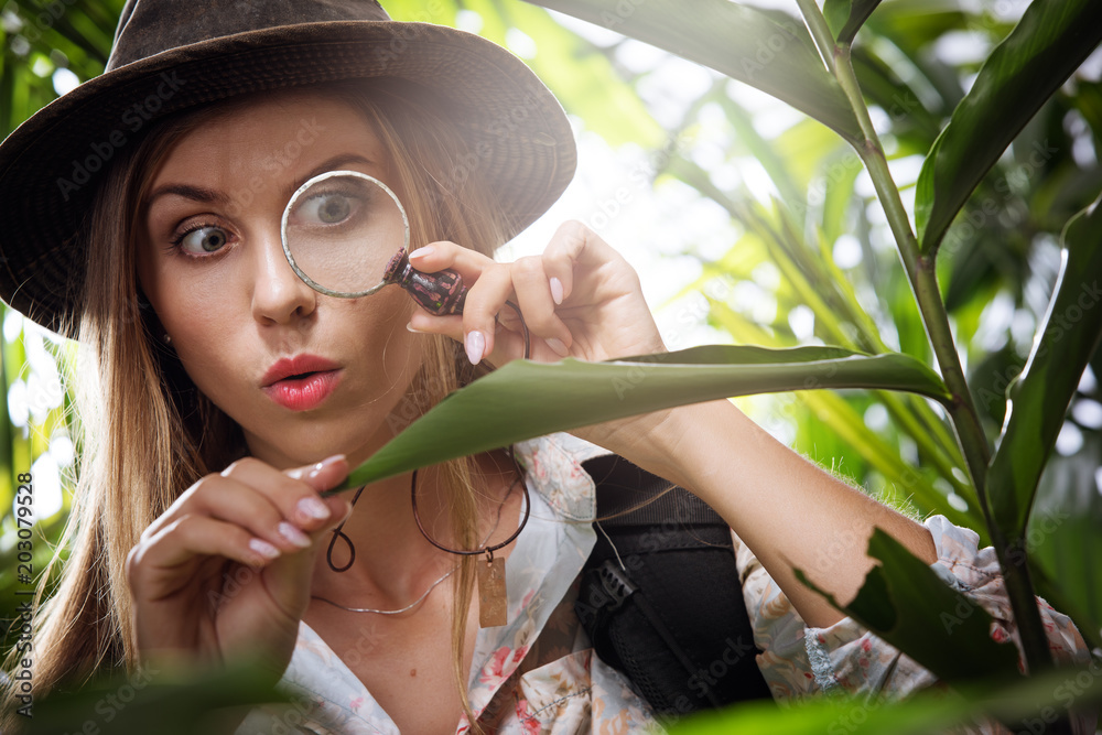 portrait of nice young woman exploring jungle environment Stock Photo ...