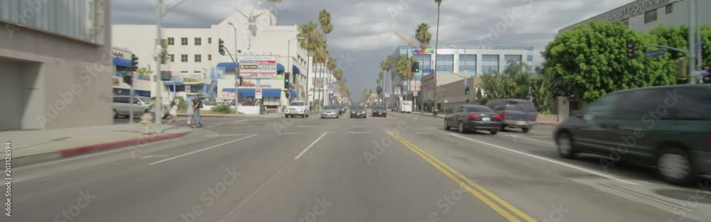 Rear view of a Driving Plate. Car turns left from Gower Street onto ...