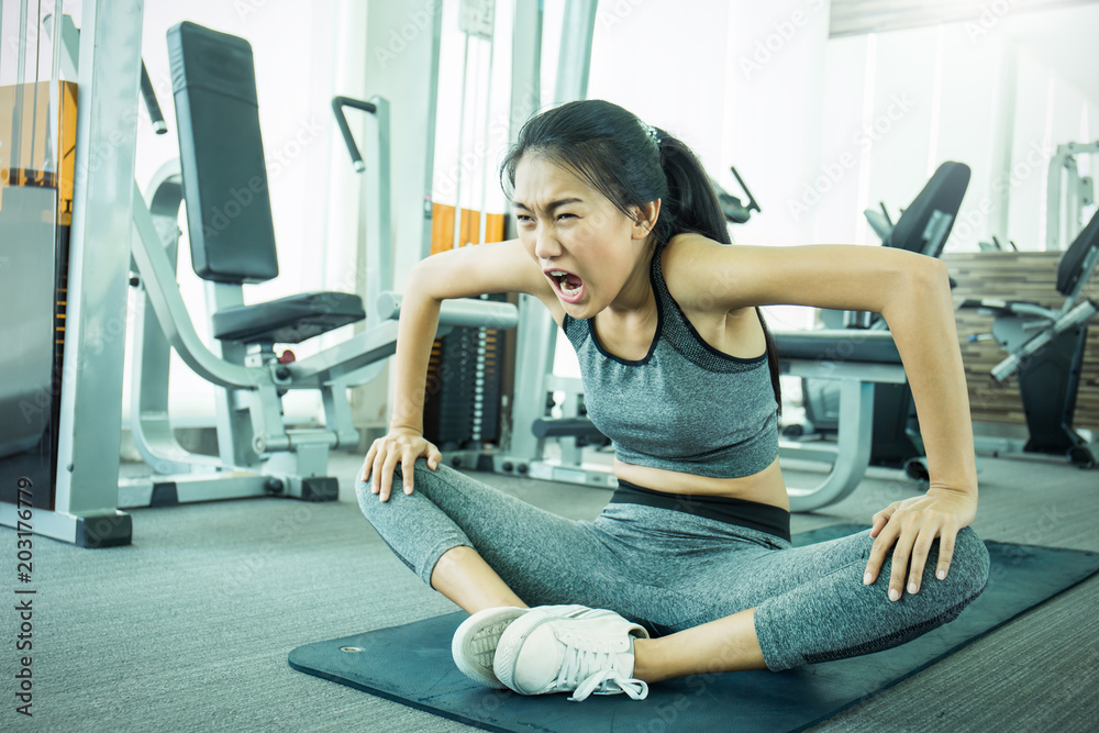 Zdjęcie Stock: Portrait of asian fitness tan woman doing warm up ...