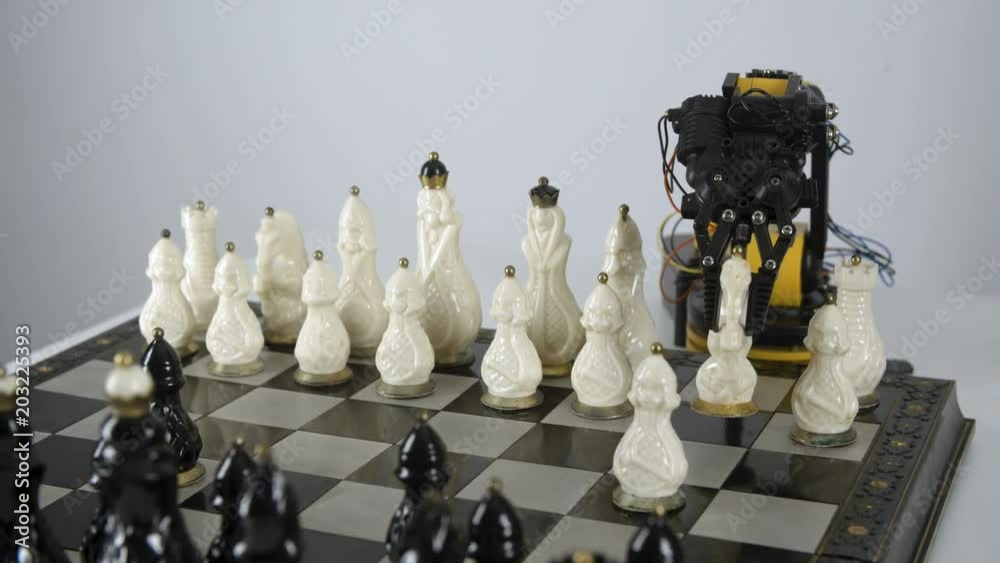 Robot Arm with Play Chess. Experiment with Intelligent Manipulator. Industrial Robot Model ...