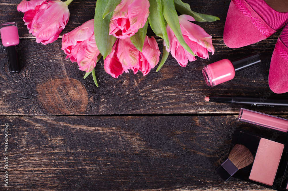 Feminine cosmetic background. Overhead of essentials of a modern woman ...