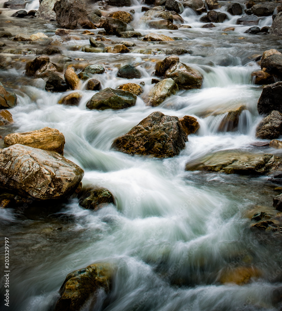 flowing river Stock Photo | Adobe Stock