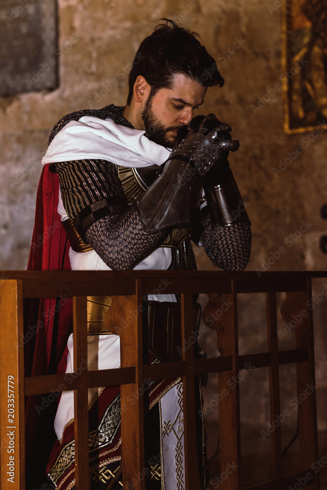 Medieval Templar soldier praying Stock Photo | Adobe Stock