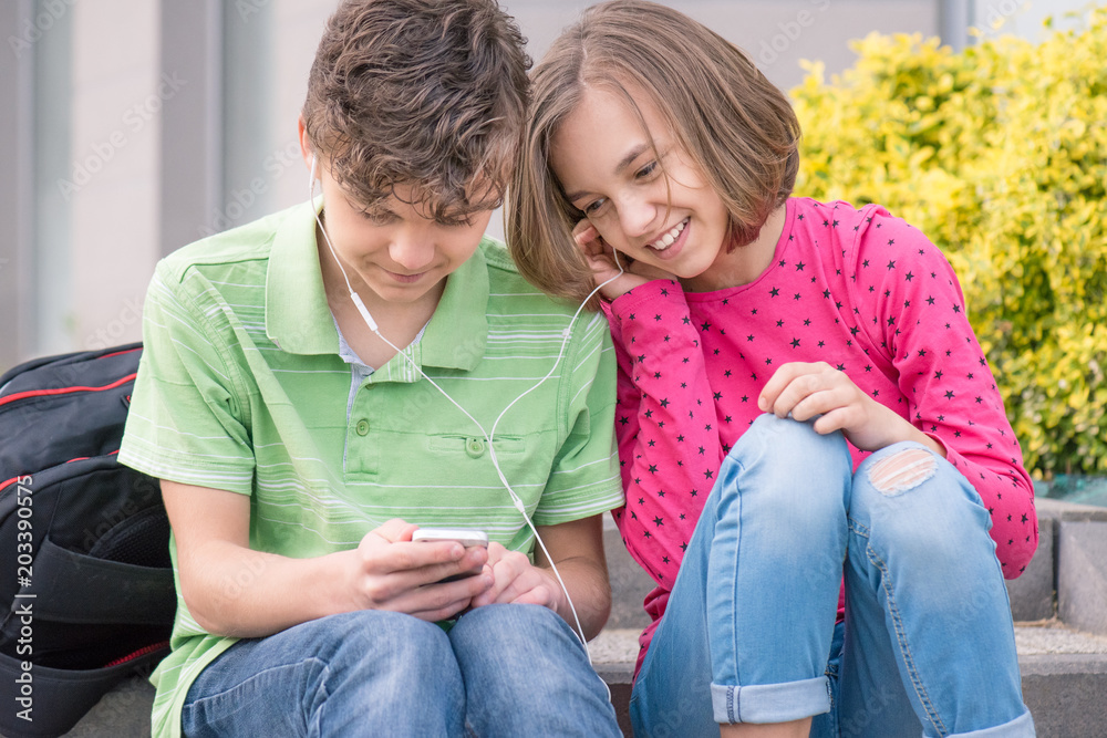 Teens Talking On The Phone