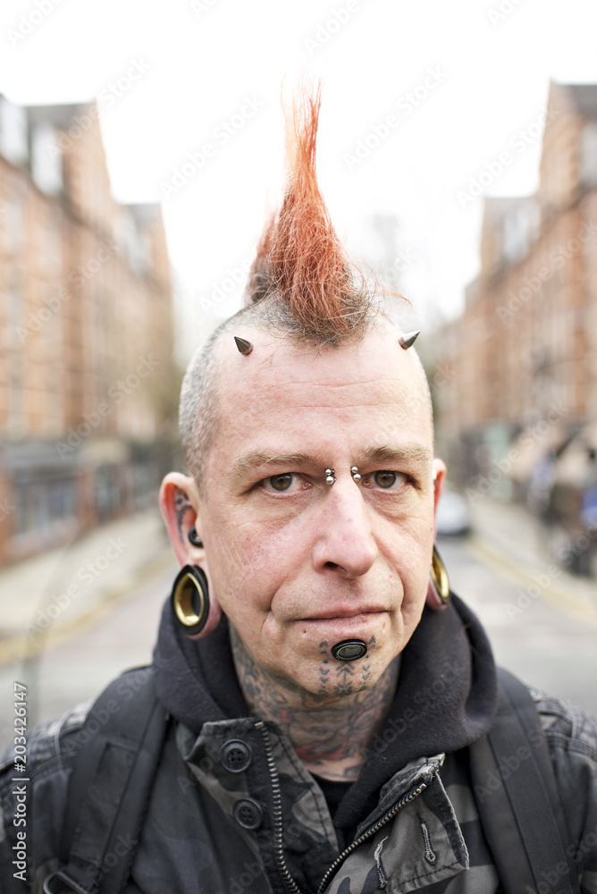 Portrait of a male punk with mohican hair Stock Photo | Adobe Stock