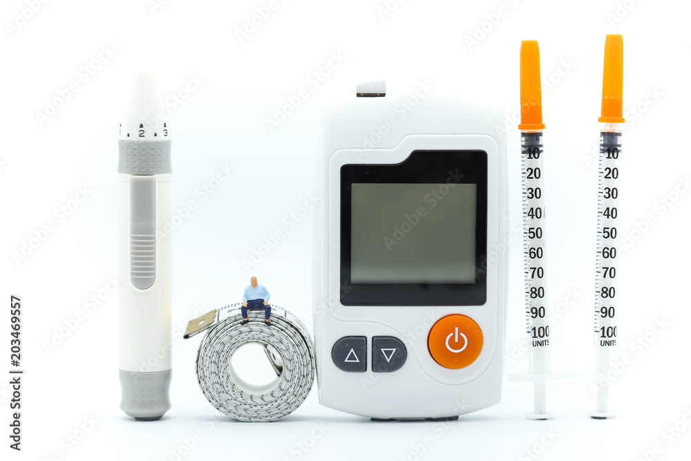 Miniature people : Doctor with patient sitting on Syringe Glucose meter ...