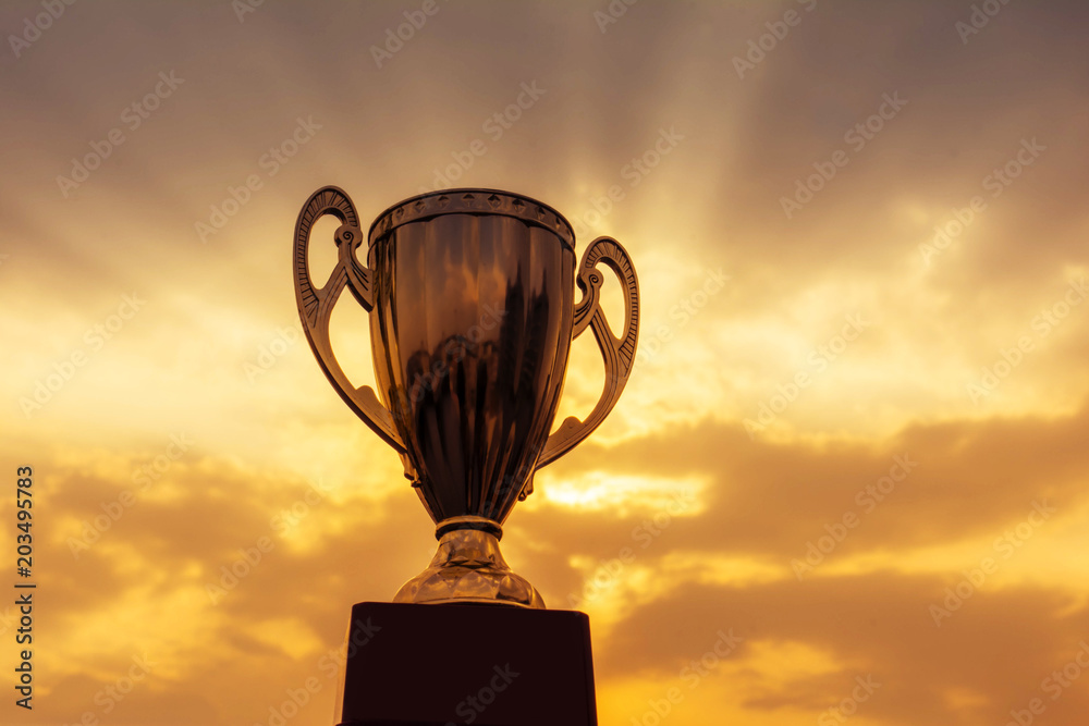 winner trophy on sky background Stock Photo | Adobe Stock
