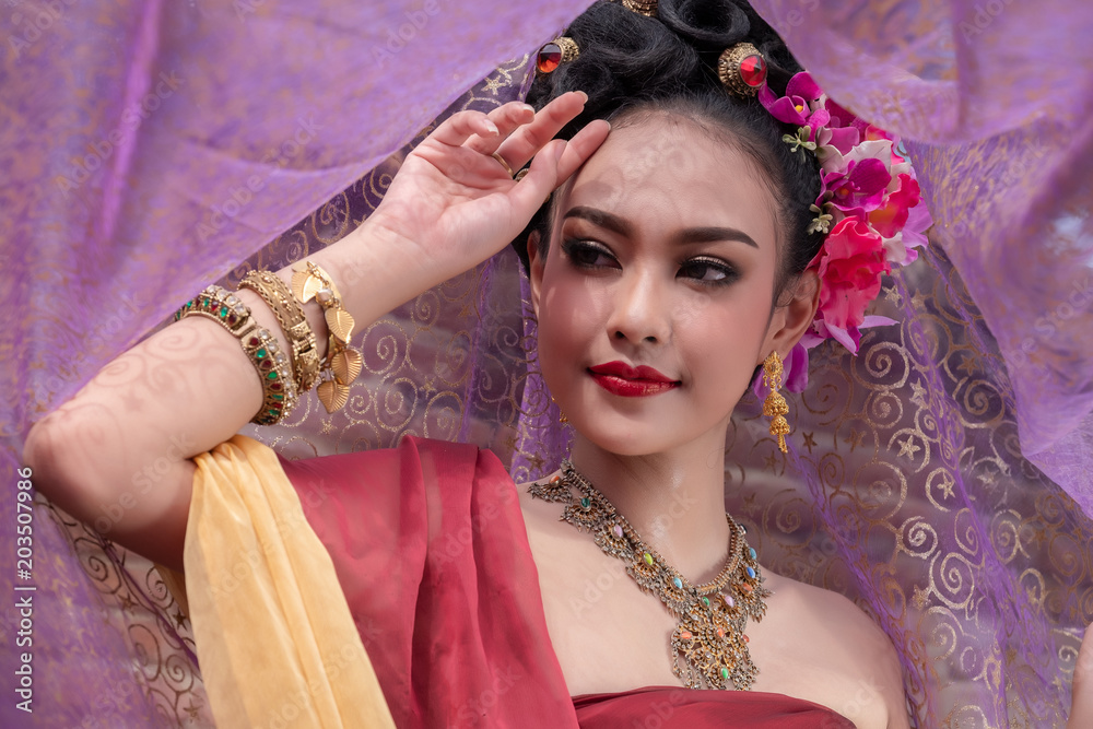 Beautiful Thai girl in traditional dress costume in Choeng Tha as Thai ...