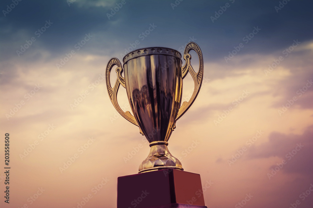 winner trophy on sky background Stock Photo | Adobe Stock