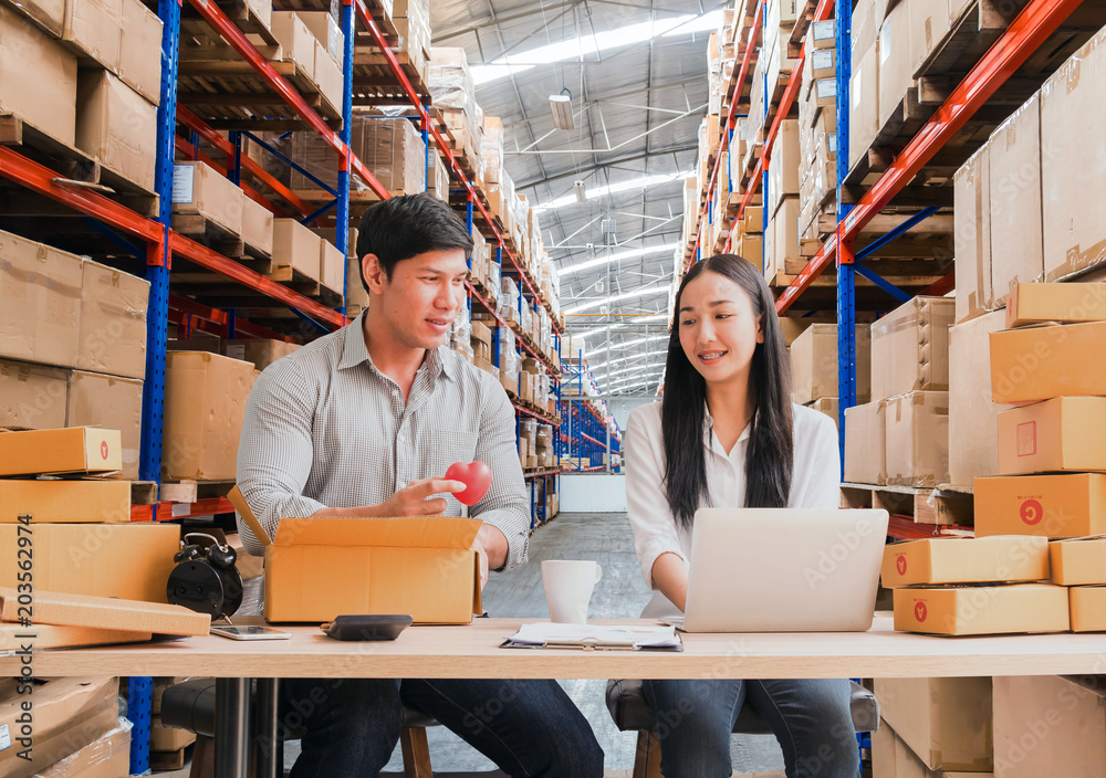 professional young online shopping company team of two co worker with ...