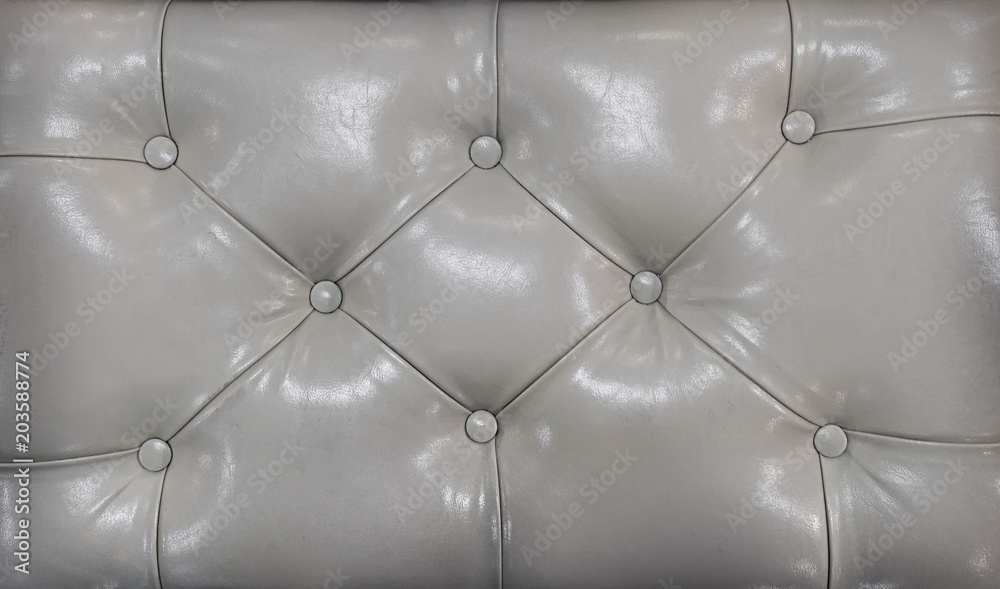 Coach-type screed. Retro light coloured chesterfield style quilted ...