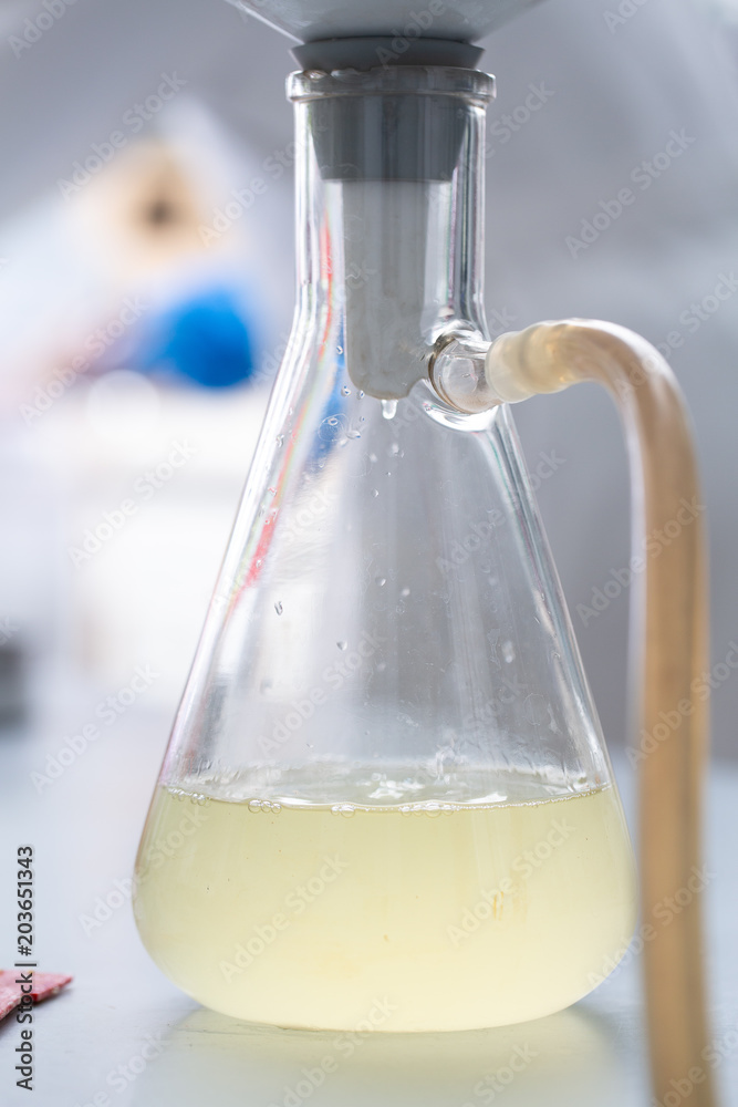 Fluid filtration in a science lab Stock Photo | Adobe Stock
