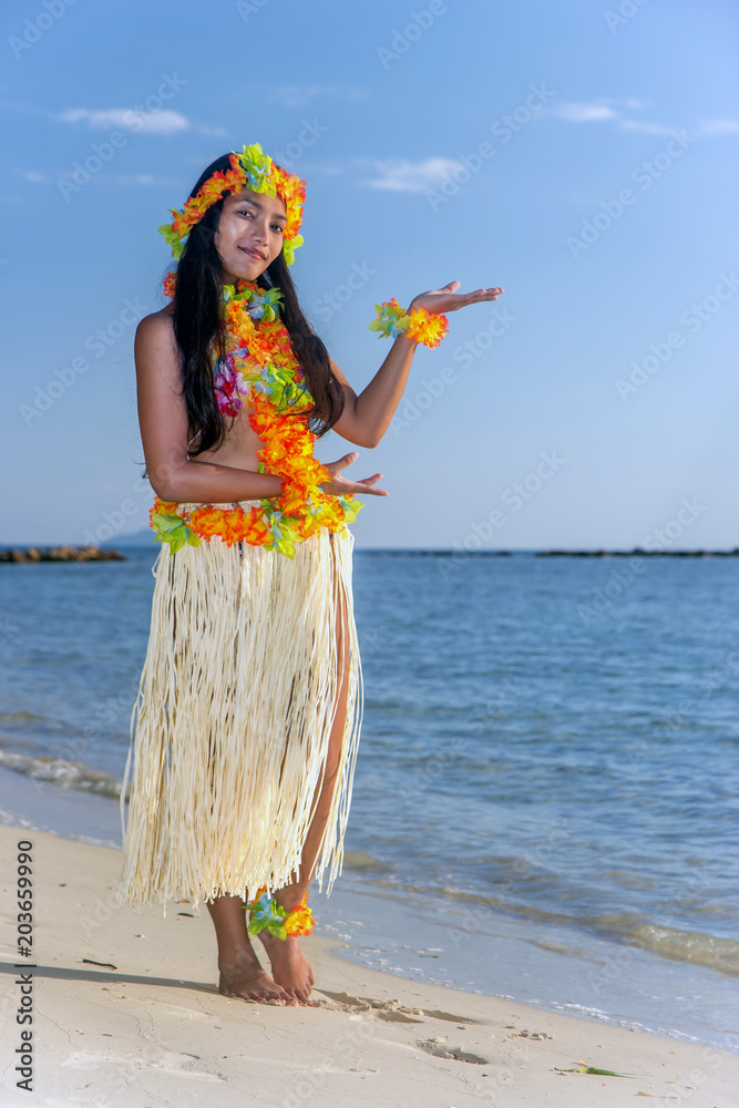 Hula Hawaii dancer dancing on the beach with horizon of sea. Ethnic ...