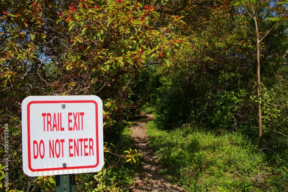 Red and White Trail Exit Do Not Enter Sign Frame Left Next to Dirt and ...