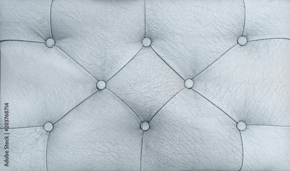 Coach-type screed. Retro light coloured chesterfield style quilted ...