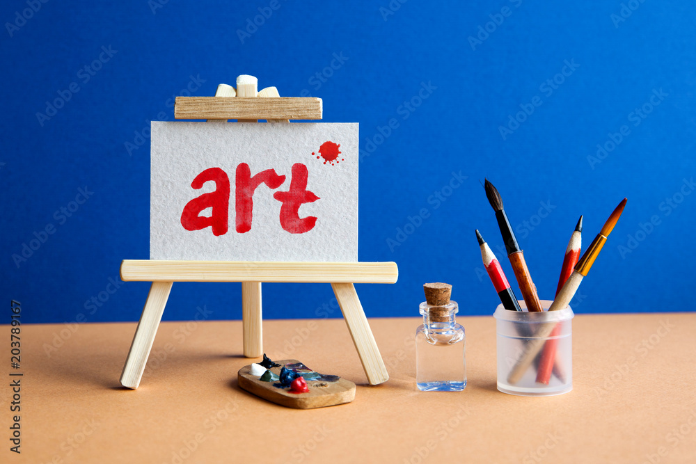 Word Art with red blot on watercolor textured paper. Beautiful wooden ...