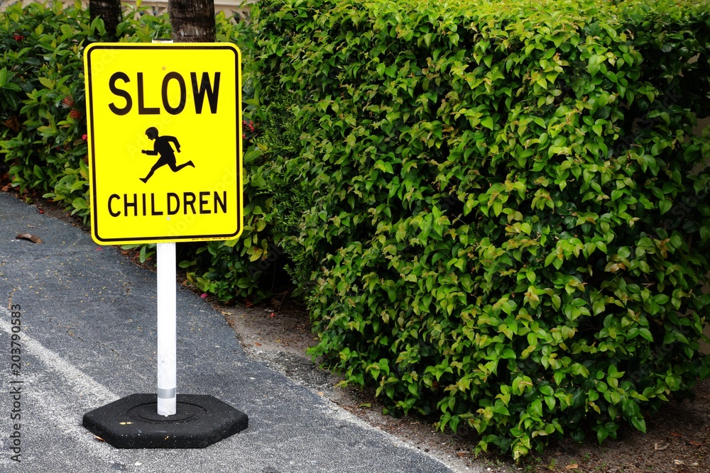 Yellow Slow Children Sign with Black Lettering and Child Crossing ...