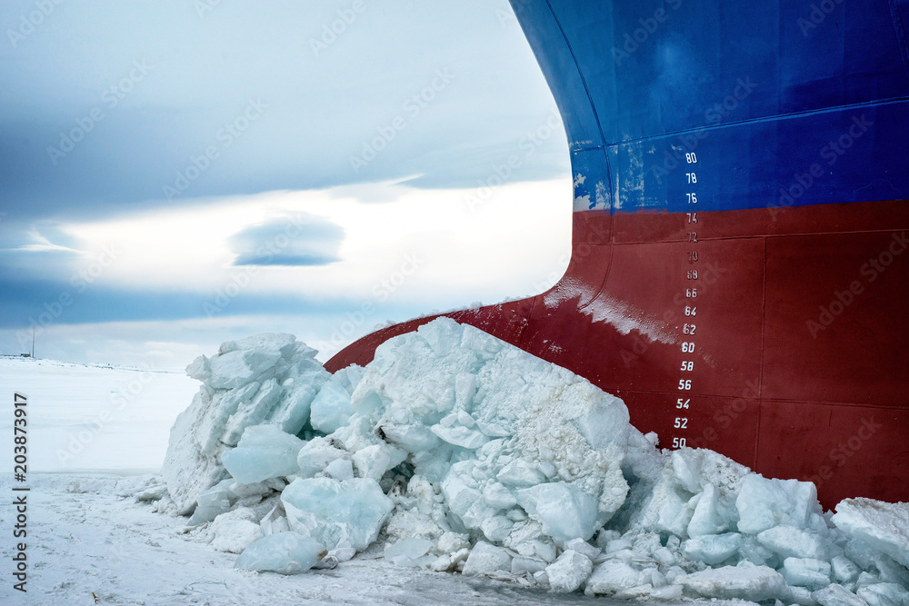 Nose icebreaker stuck in the ice of the Arctic landscape. Begins a snow ...