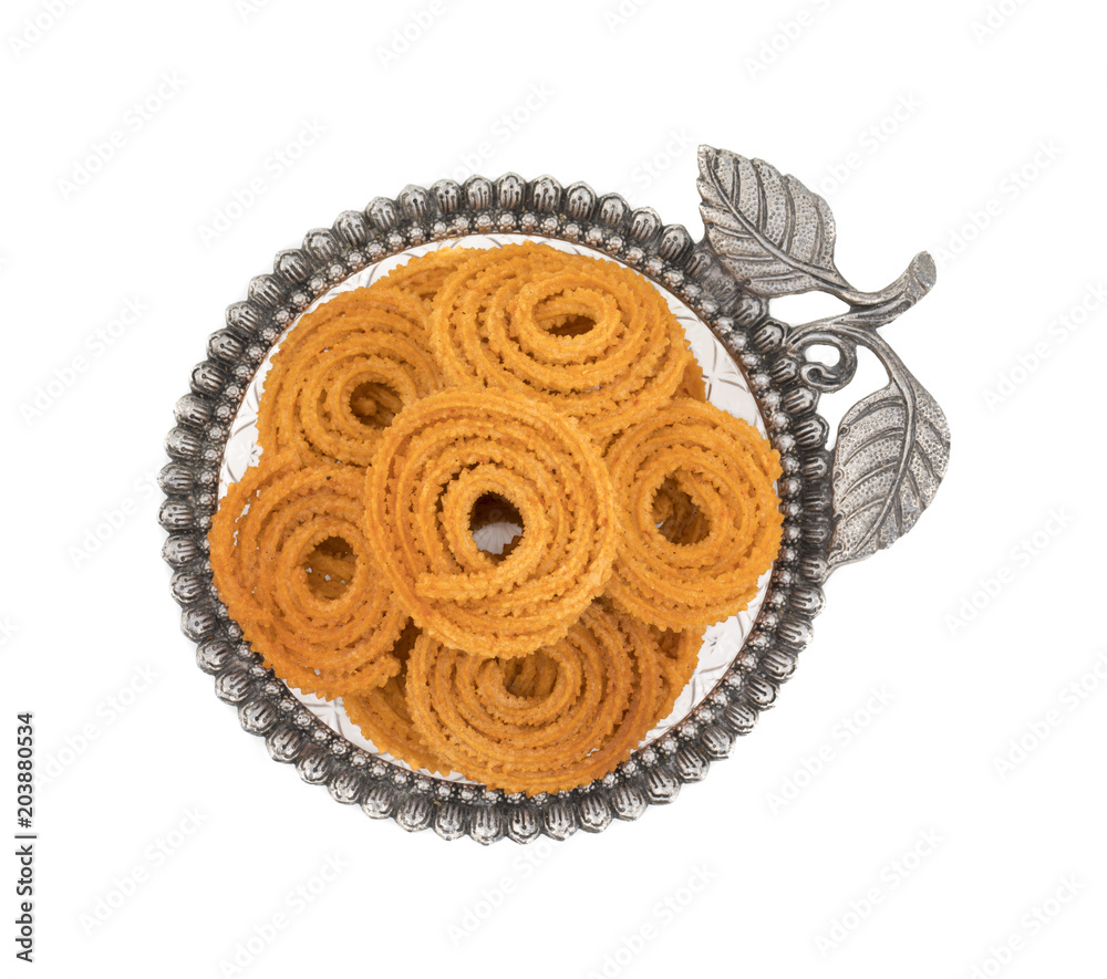 Indian Traditional Snack Chakli, a spiral shaped crisp deep fried snack ...