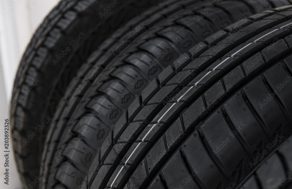 Protector of automobile tires. A number of automobile tires. Close up ...