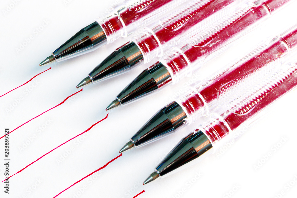 five traces of red paste from red pens on white paper, red lines on ...