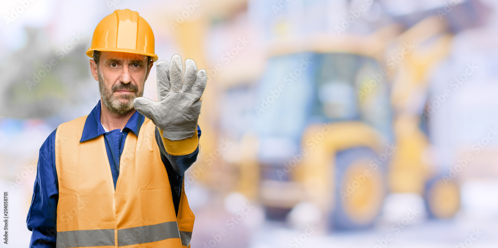 Senior engineer man, construction worker annoyed with bad attitude ...