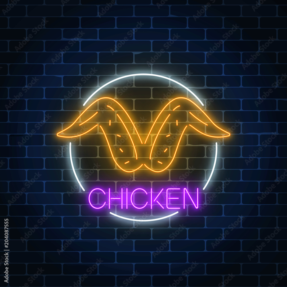 Neon glowing sign of chicken wings in circle frame on a dark brick wall ...