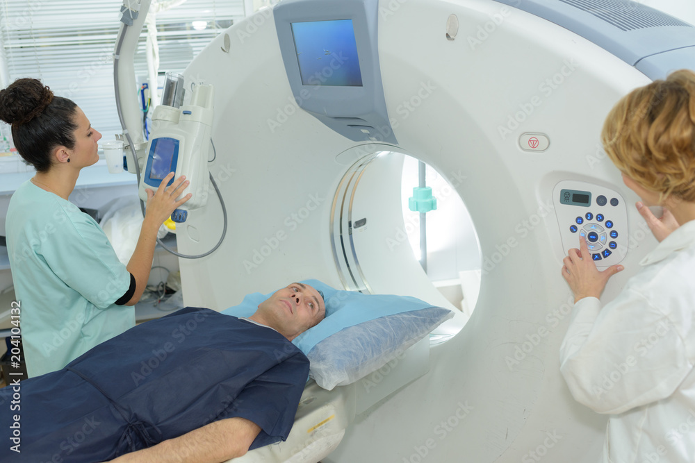 patient undergoing mri scan at hospital Stock Photo | Adobe Stock