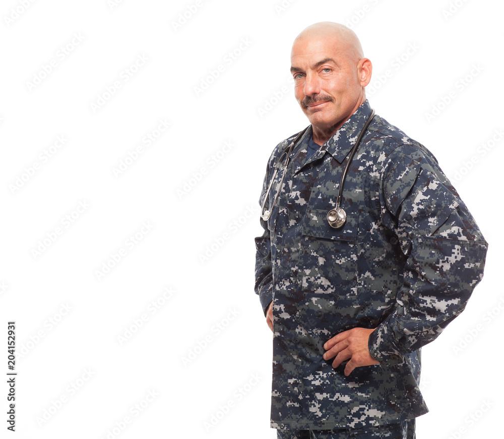 Serious Navy doctor on white background. Stock Photo | Adobe Stock