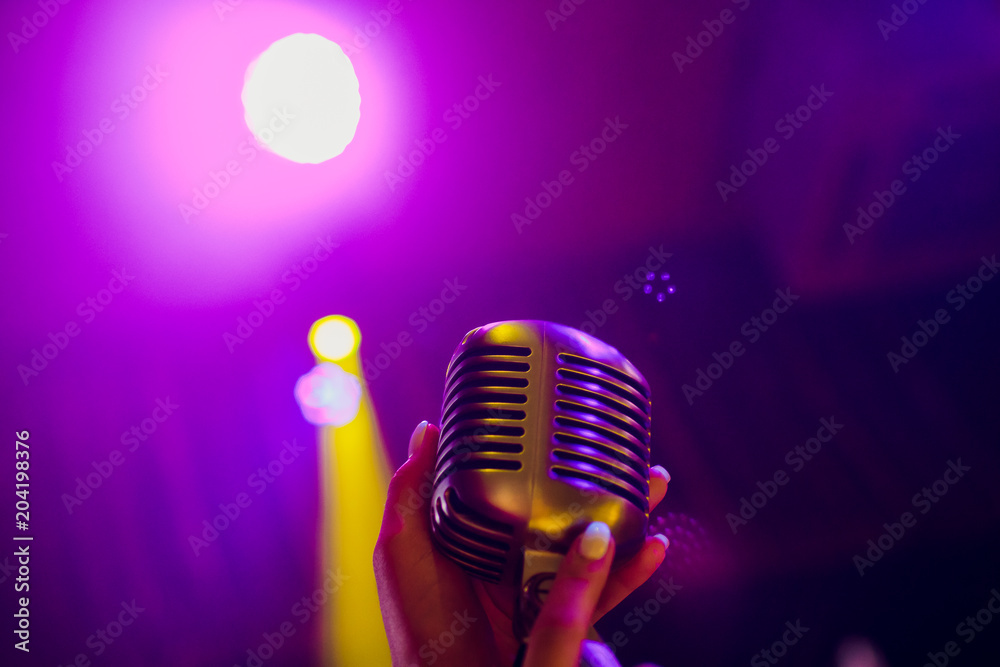 microphone on stand up comedy stage with reflectors ray, high contrast ...