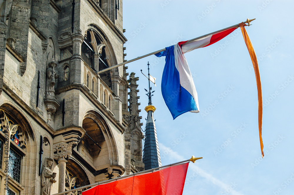 Tangled flag to old city hall Gouda. The Netherlands. Stock Photo ...