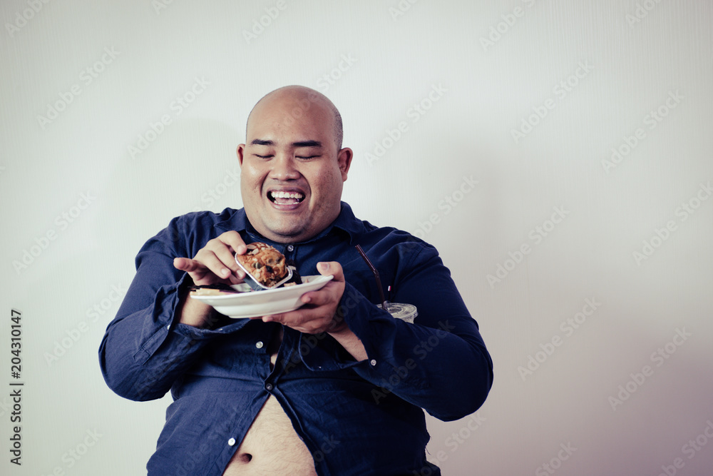 fat man eating, portrait of overweight person feels hungry and eating ...