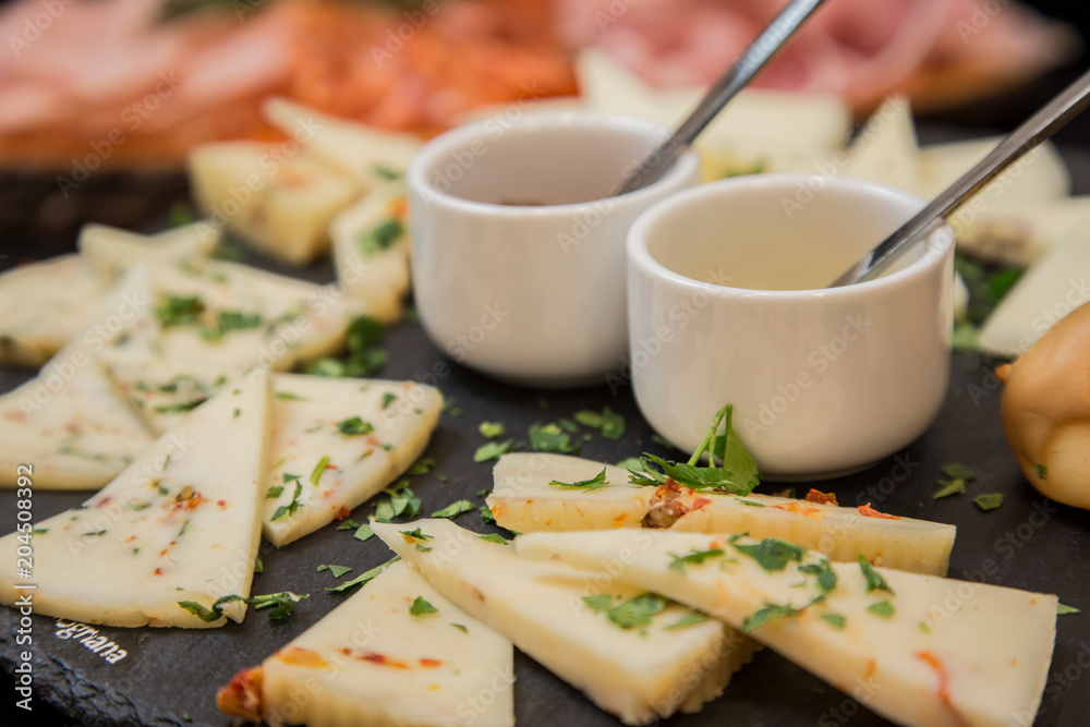 Traditional italian aperitif with proscioutto, mortadella sausage ...