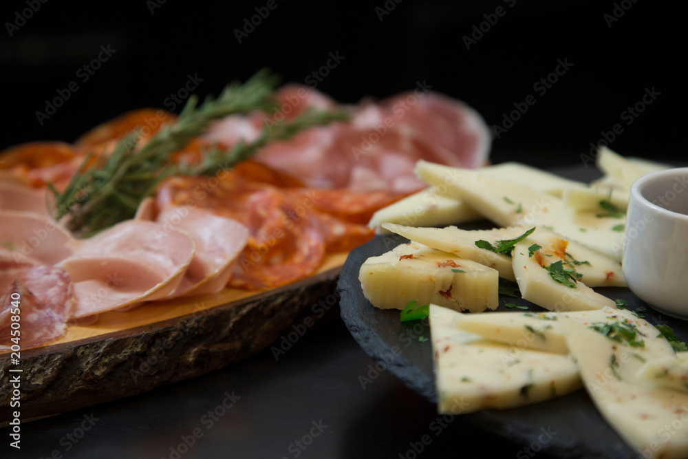Traditional italian aperitif with proscioutto, mortadella sausage ...