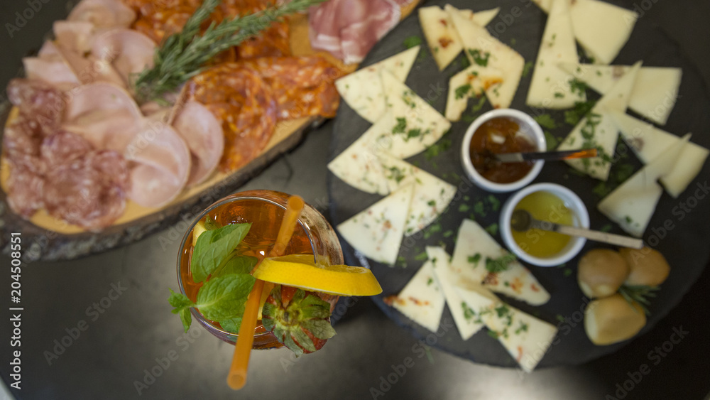 Traditional italian aperitif with proscioutto, mortadella sausage ...