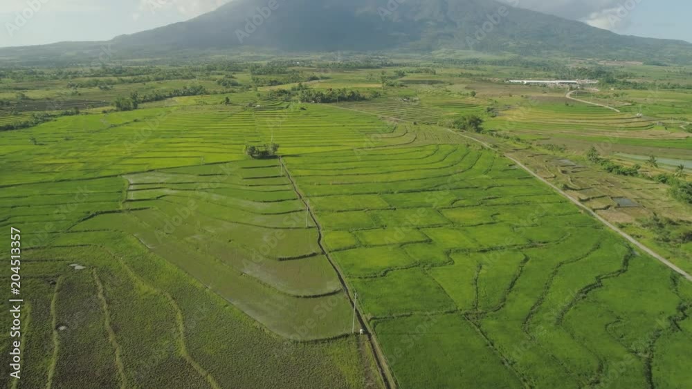 Mountain valley with farmland, rice terraces near mount Isarog. Aerial ...