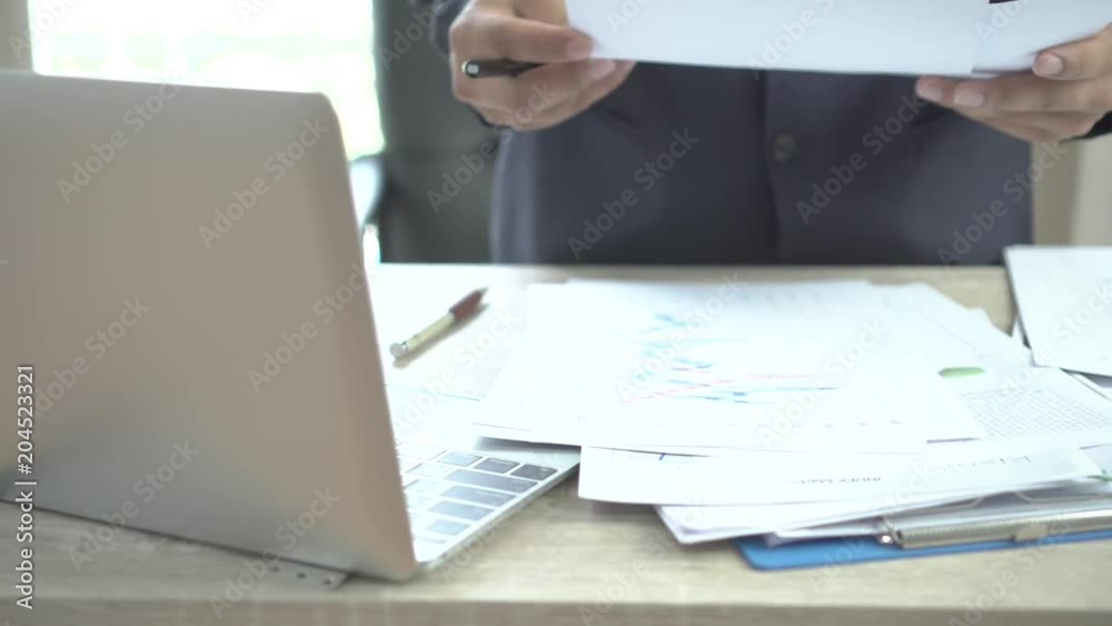 Document Report and business busy Concept: Businessman Manager checking ...
