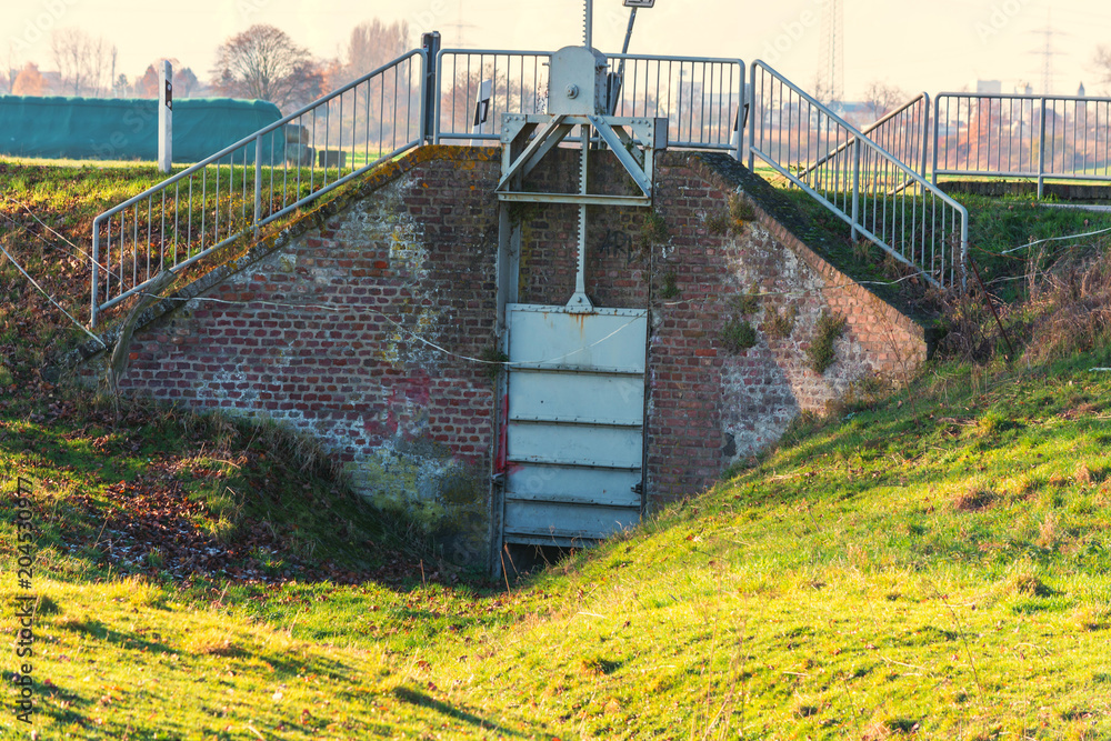 Dewatering trench with dewatering slider. Stock Photo | Adobe Stock
