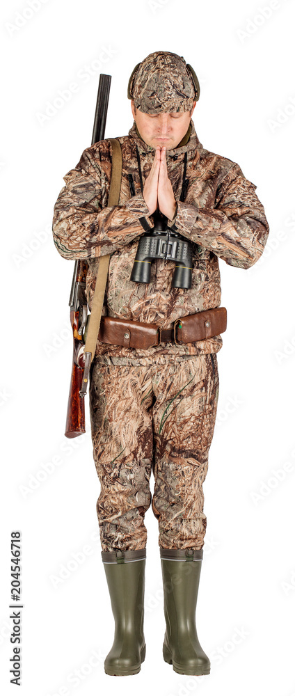 Full length portrait of a male hunter with double barreled shotgun ...