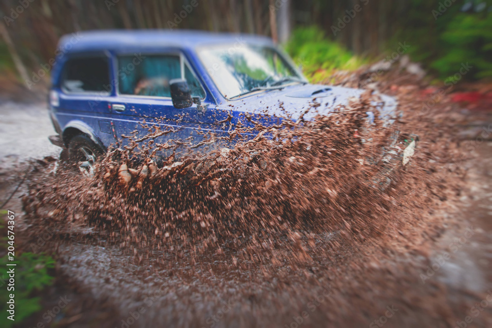 Suv offroad 4wd car rides through muddy puddle, off-road track road ...