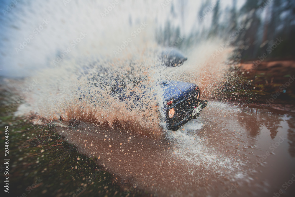Suv offroad 4wd car rides through muddy puddle, off-road track road ...