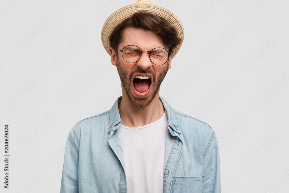 People, aggression, discontent concept. Photo of bearded desperate male ...