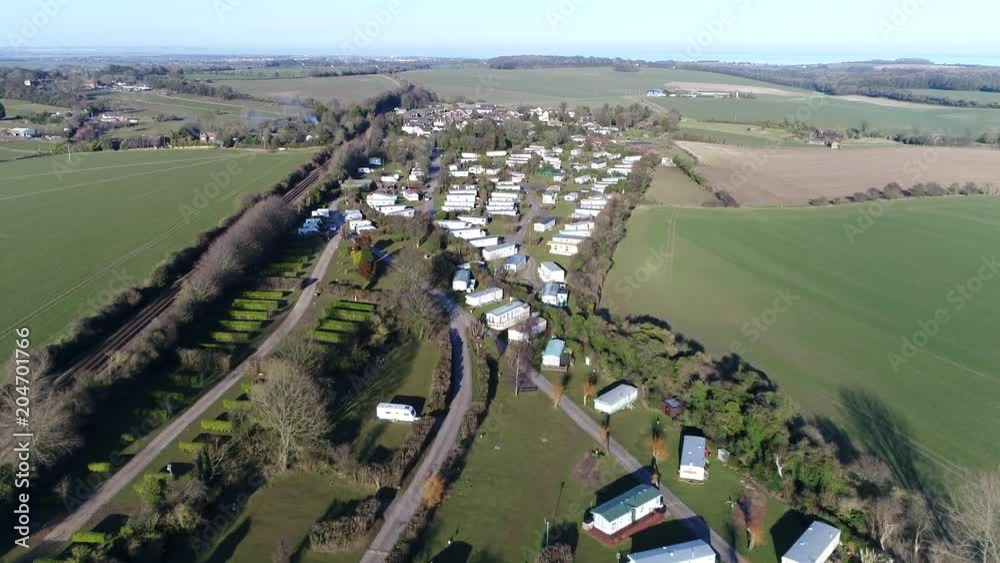 Aerial bird view footage of Farm Campsite and Holiday Park showing the ...