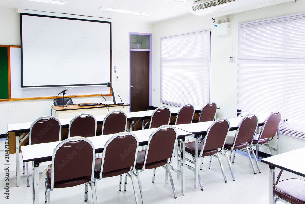 White classrooms are currently available with student desks and chairs ...
